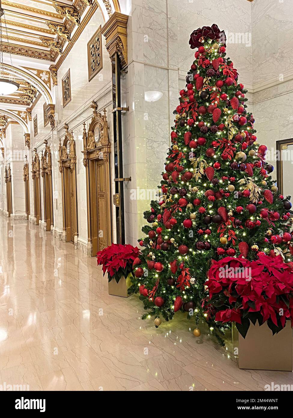 A Christmas tree displayed in the lobby of the Trinity building at 111 ...