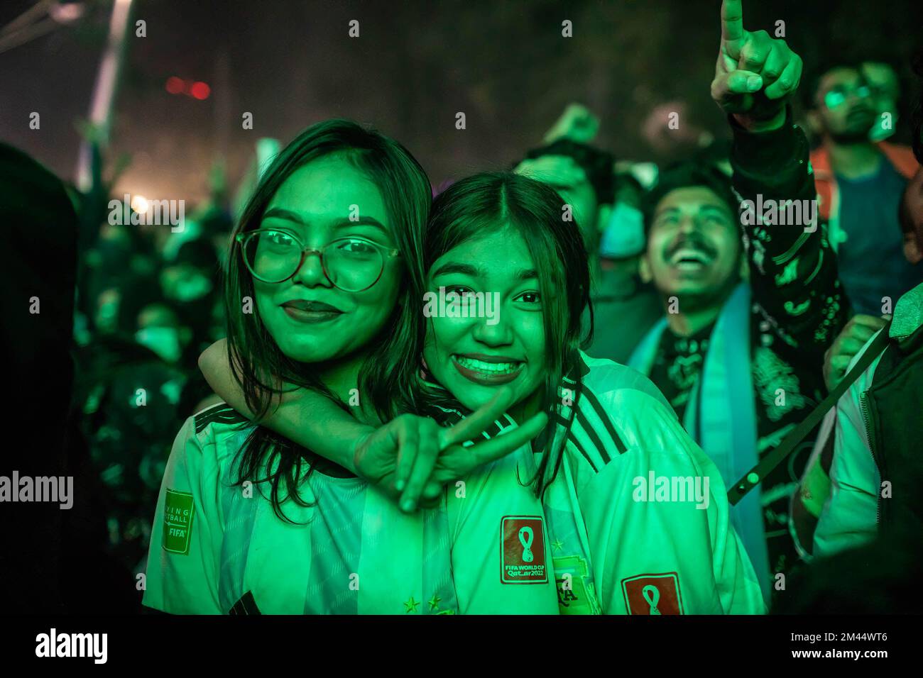 Argentina soccer fans pose for a photo during celebration of their team's victory against France ...