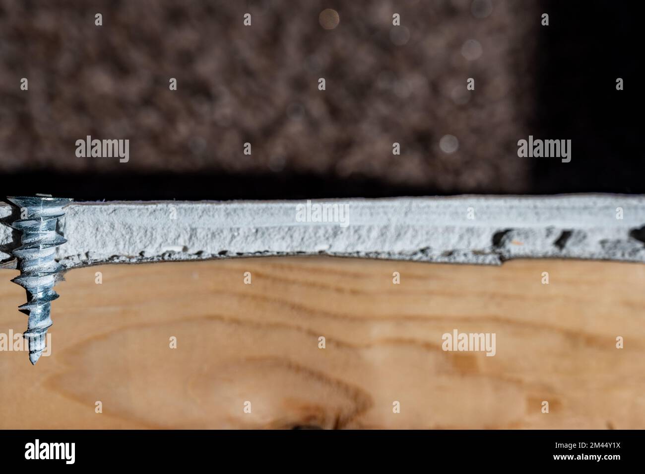 Side view of a drywall mount anchor and screw Stock Photo - Alamy