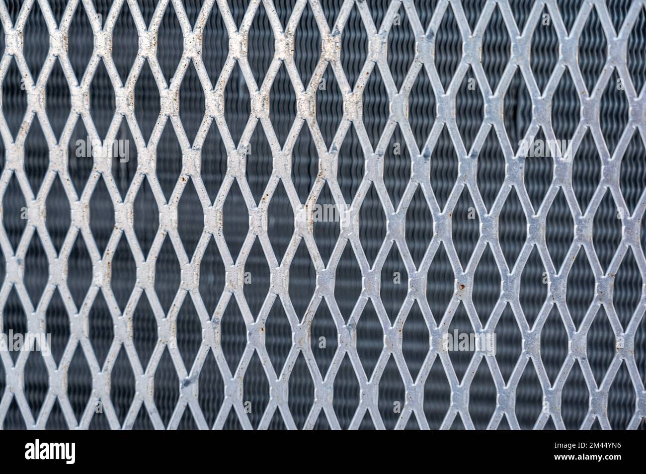 Metal screen and heat exchanging fins of a air conditioner Stock Photo ...