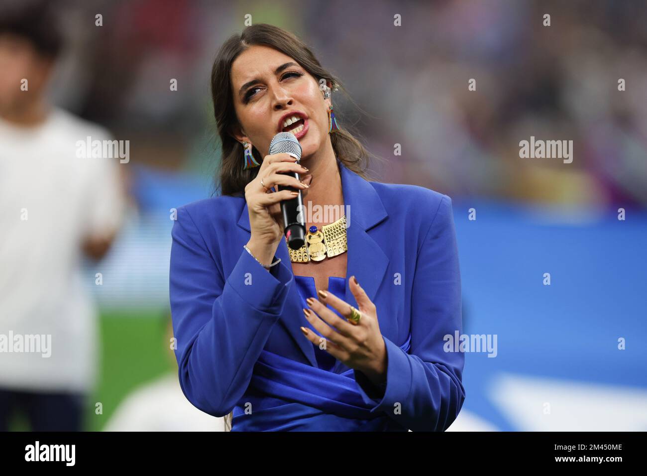 Doha, Qatar. 18th Dec, 2022. Singer Farrah El Dibany sings the national ...