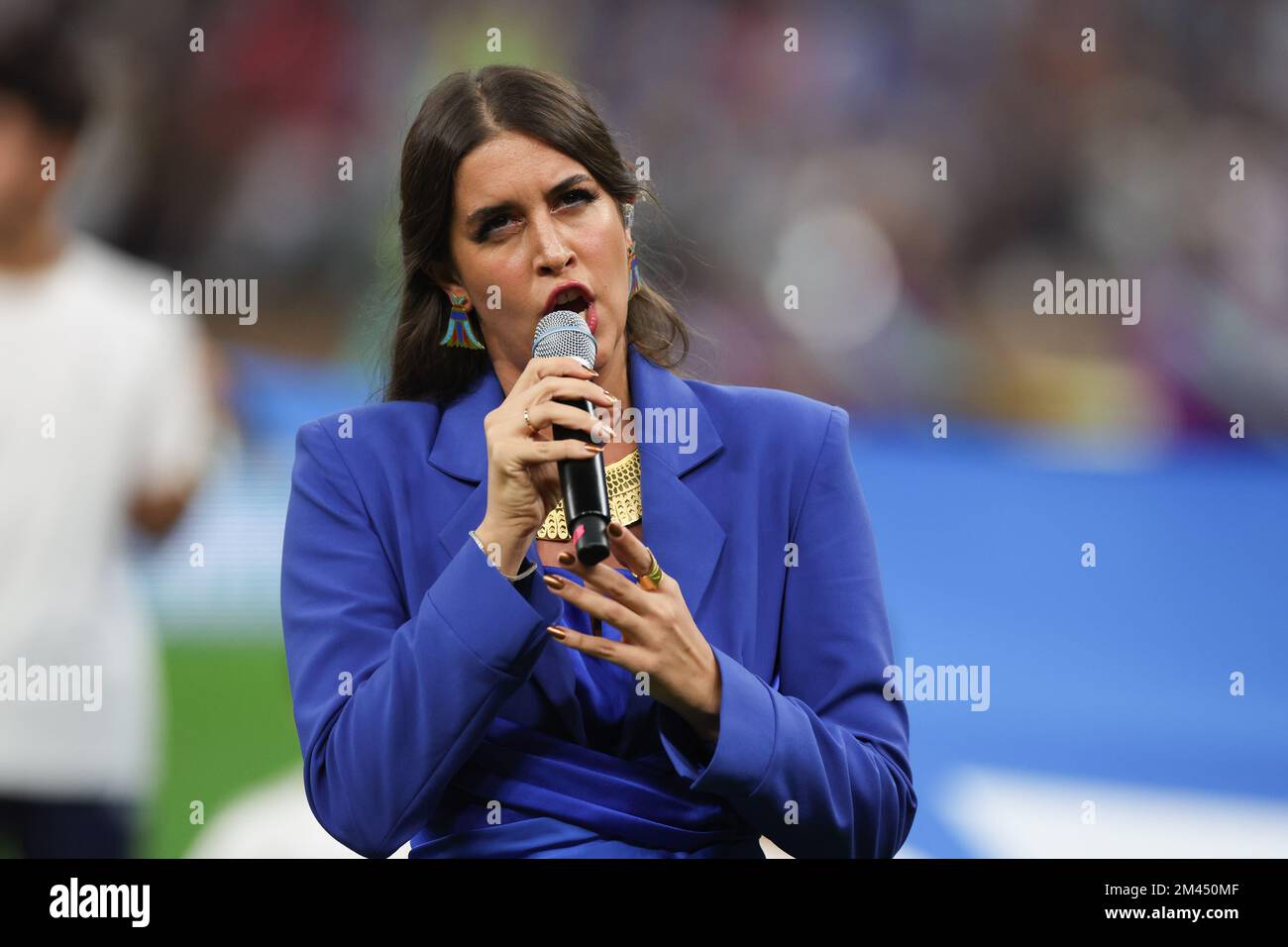 Doha, Qatar. 18th Dec, 2022. Singer Farrah El Dibany sings the national ...