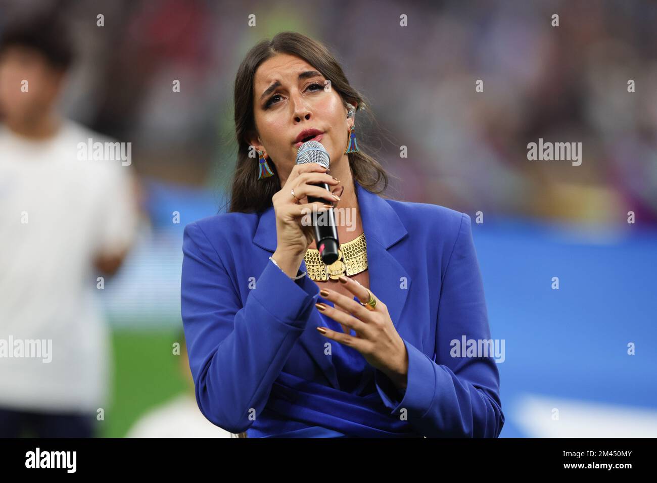 Doha, Qatar. 18th Dec, 2022. Singer Farrah El Dibany sings the national ...