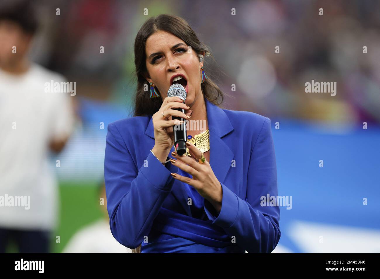 Doha, Qatar. 18th Dec, 2022. Singer Farrah El Dibany sings the national ...