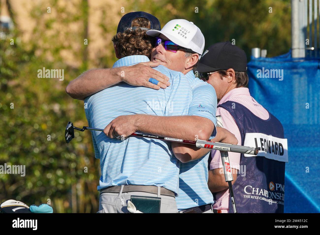 Orlando, Florida, USA. 18th Dec, 2022. Justin Leonard (R) shares a hug ...