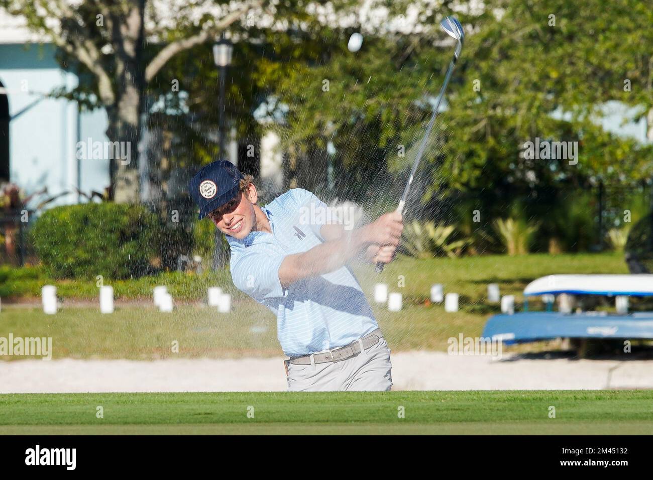 Orlando, Florida, USA. 18th Dec, 2022. Luke Leonard hits out of a ...