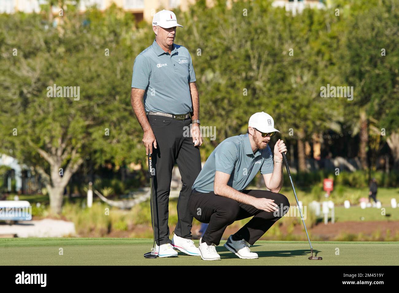 Orlando, Florida, USA. 18th Dec, 2022. Connor Cink (R) and his father ...