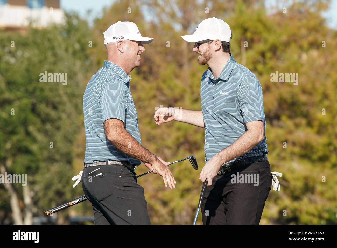 Orlando, Florida, USA. 18th Dec, 2022. Connor Cink (R) and his father ...