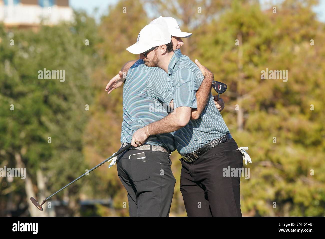 Orlando, Florida, USA. 18th Dec, 2022. Connor Cink (R) and his father ...
