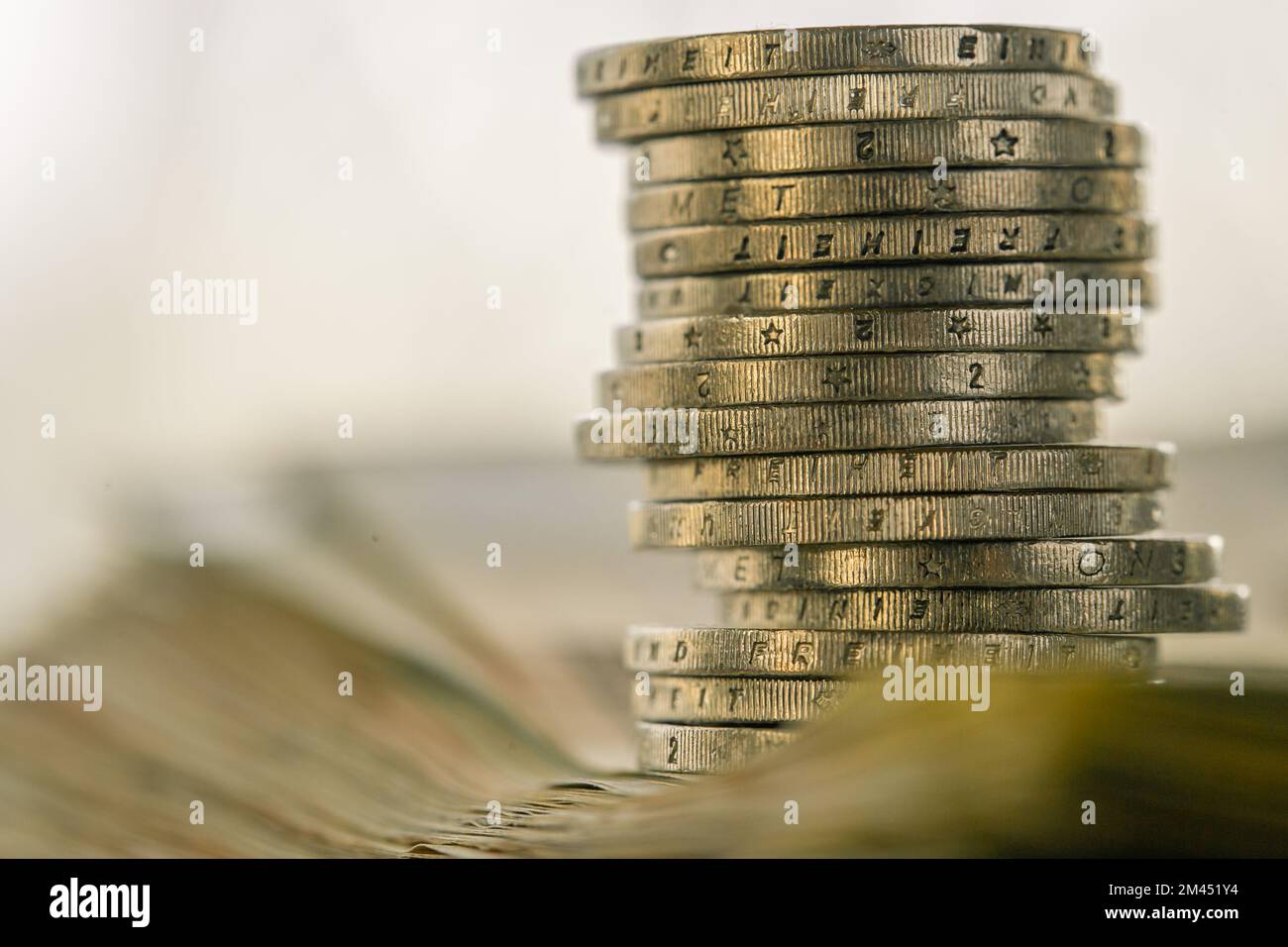 Money and finance. Euro currency. coins on banknotes on a blurred white ...