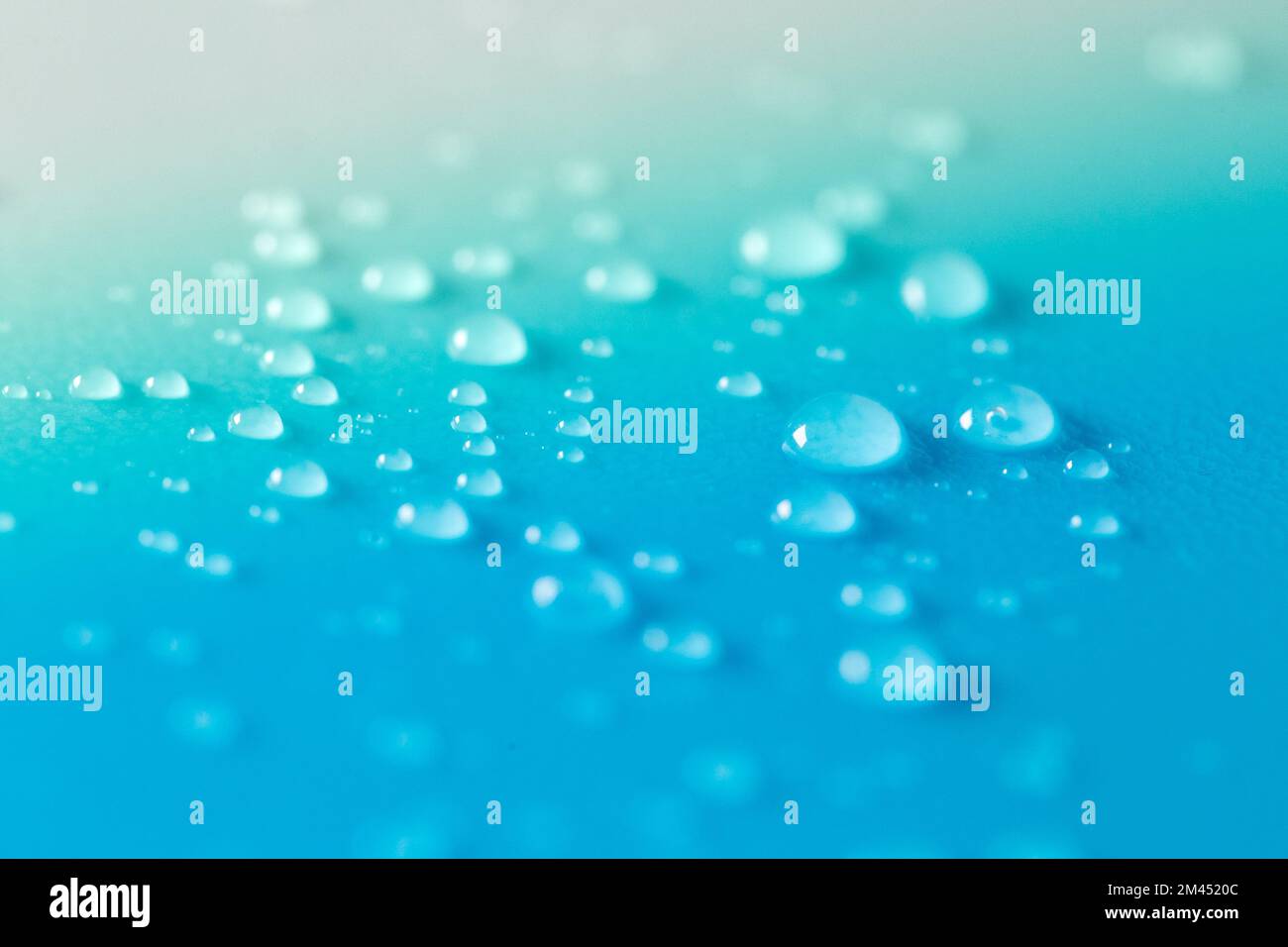 Water drops beautiful background.water drops on a blue background with ...