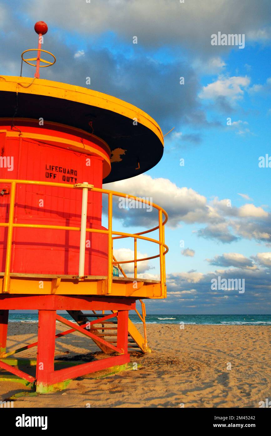 A pink and yellow Art Deco Lifeguard Shelter resides on the sand South ...