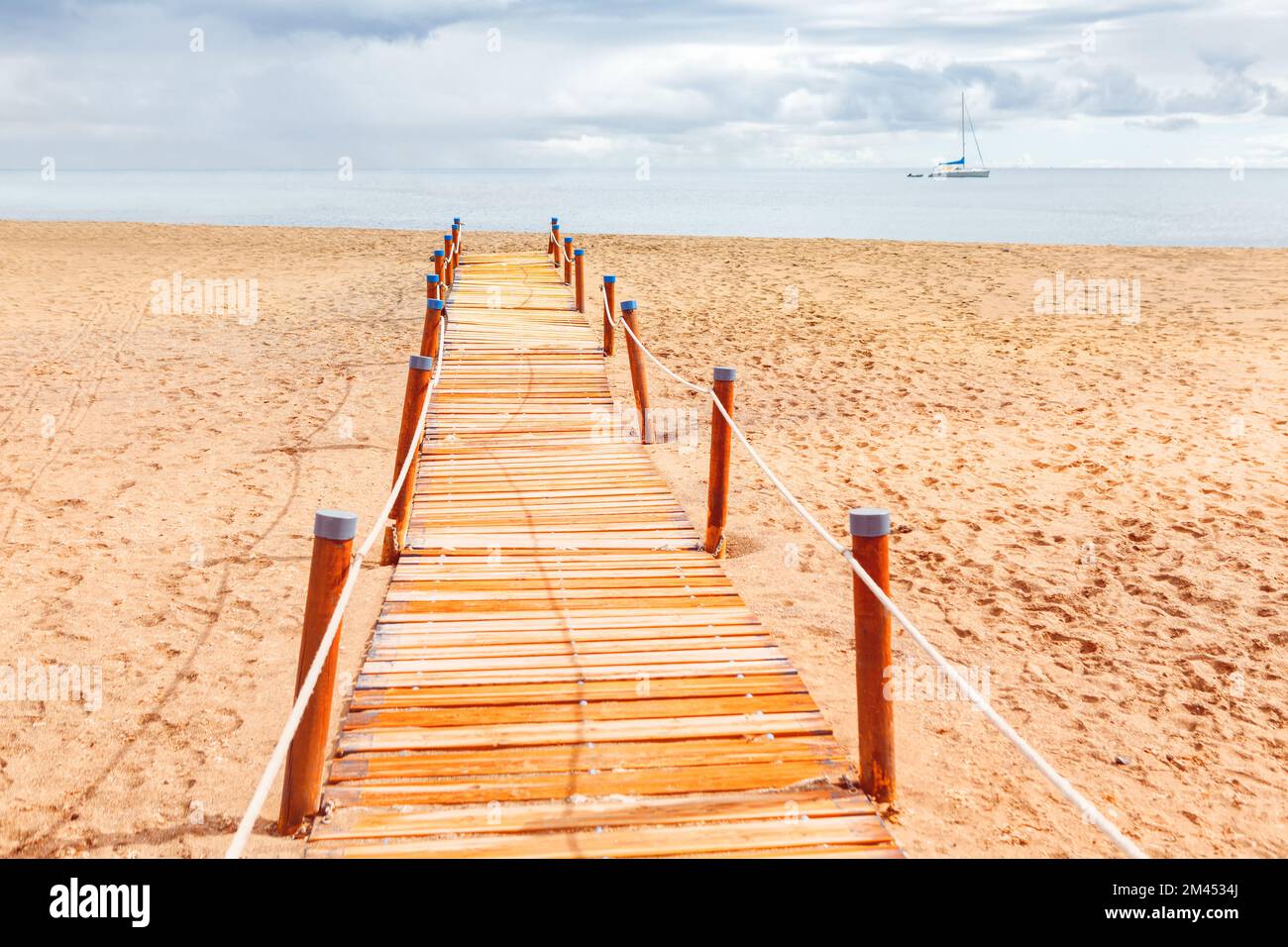 Pathway at the beach . Sandy coast with walking path Stock Photo - Alamy