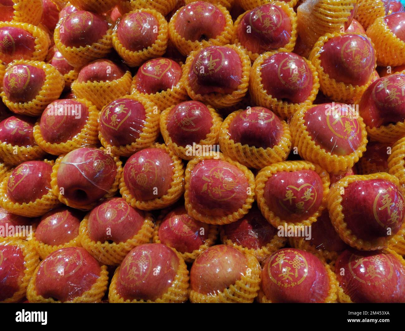 YICHANG, CHINA - DECEMBER 18, 2022 - An apple printed with "Christmas ...