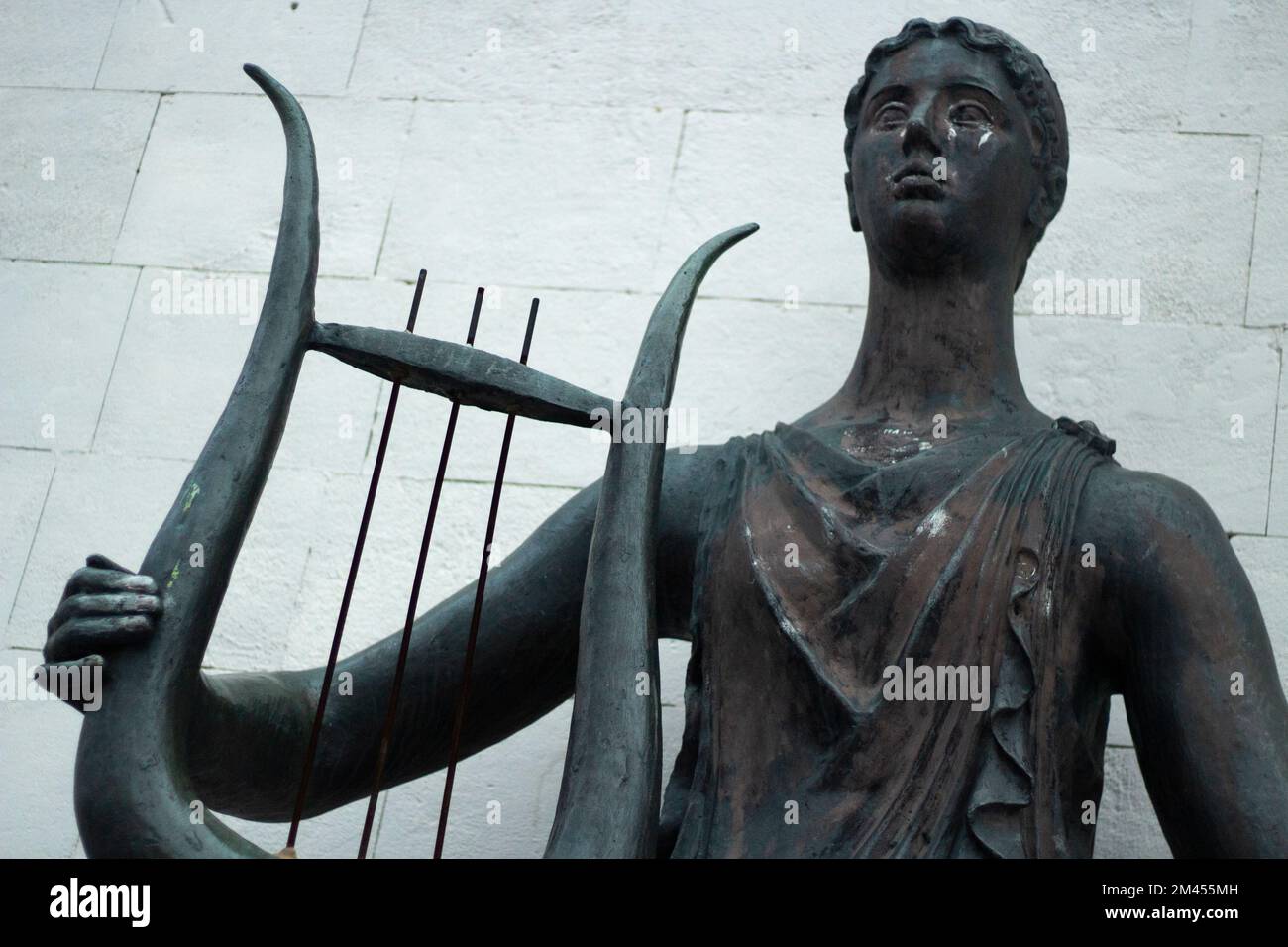 Statue of Greek goddess of inspiration. Sculpture made of metal. Women ...