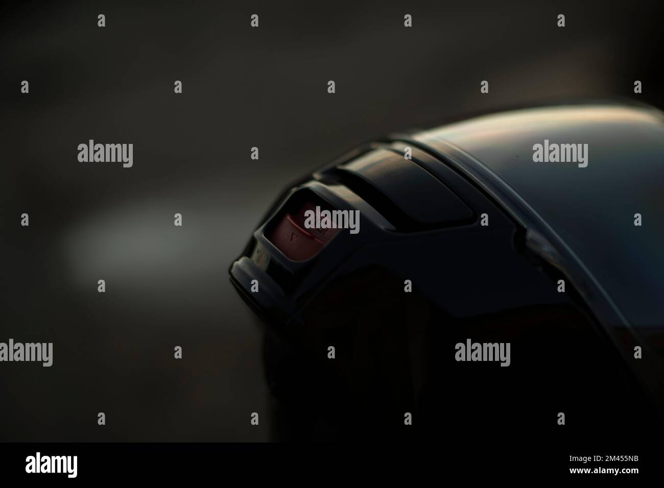 Motorcyclist's helmet is black. Biker head protection. Headgear details ...
