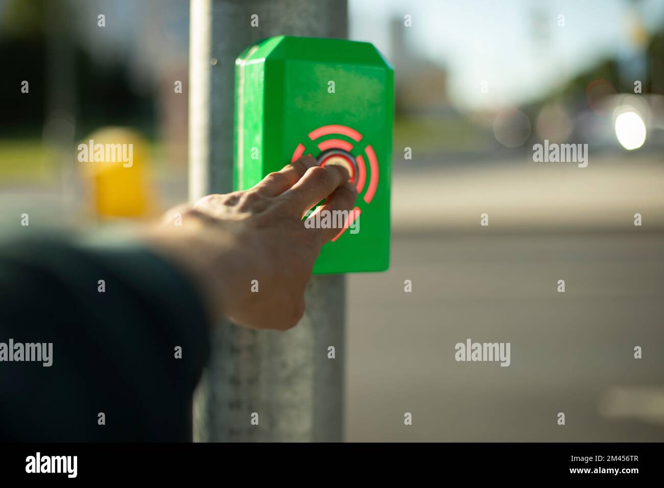 Pedestrian crossing alarm button. Button for road. Clicking on panel ...