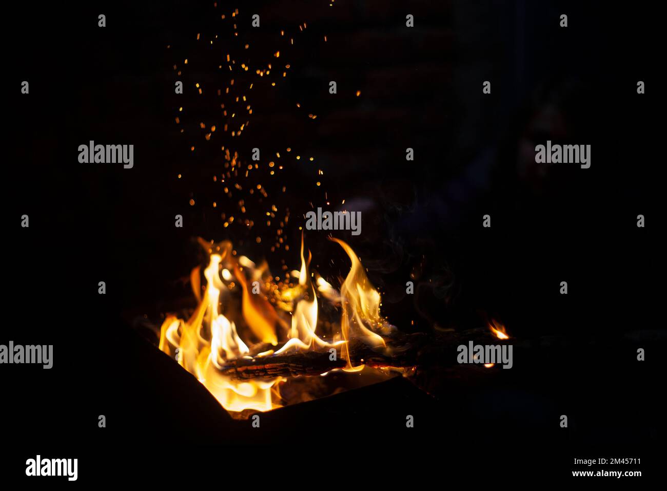 Flames of pyre. Fire in dark. Burning firewood. Details of night ...