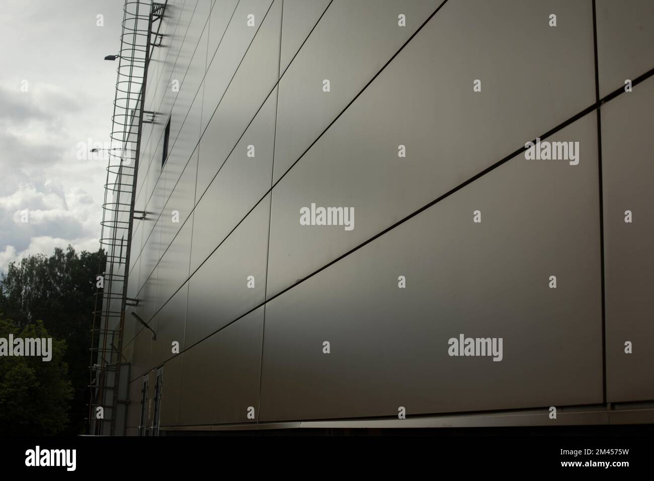 Shopping center building without windows. Wall details. stairs to roof ...