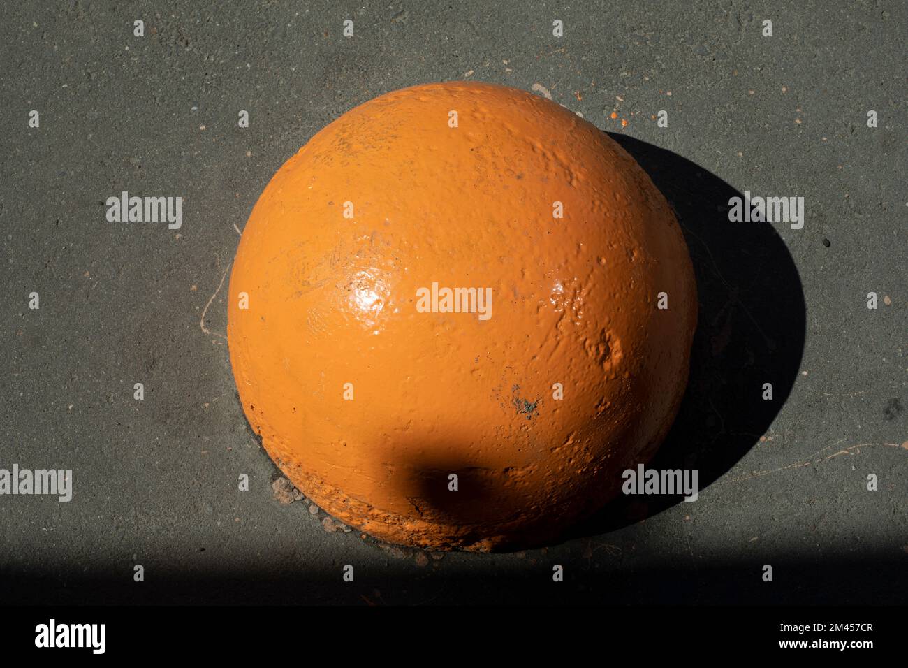 Orange motion blocker. Parking post. Sphere for transport. Traffic ...