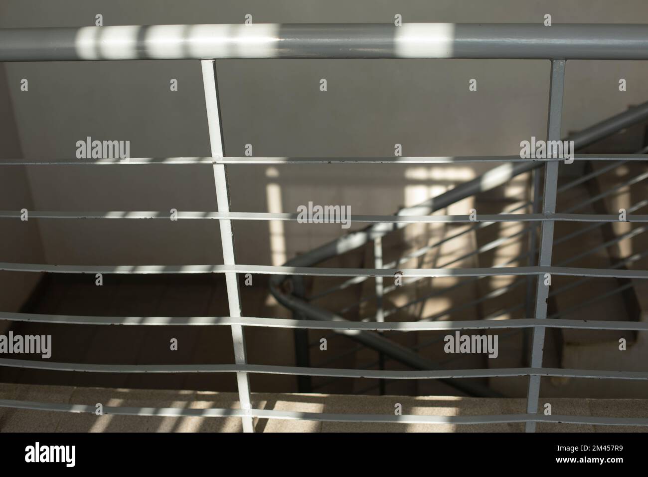 Railing on stairs. Interior in building. Handrail for support. Barrier ...