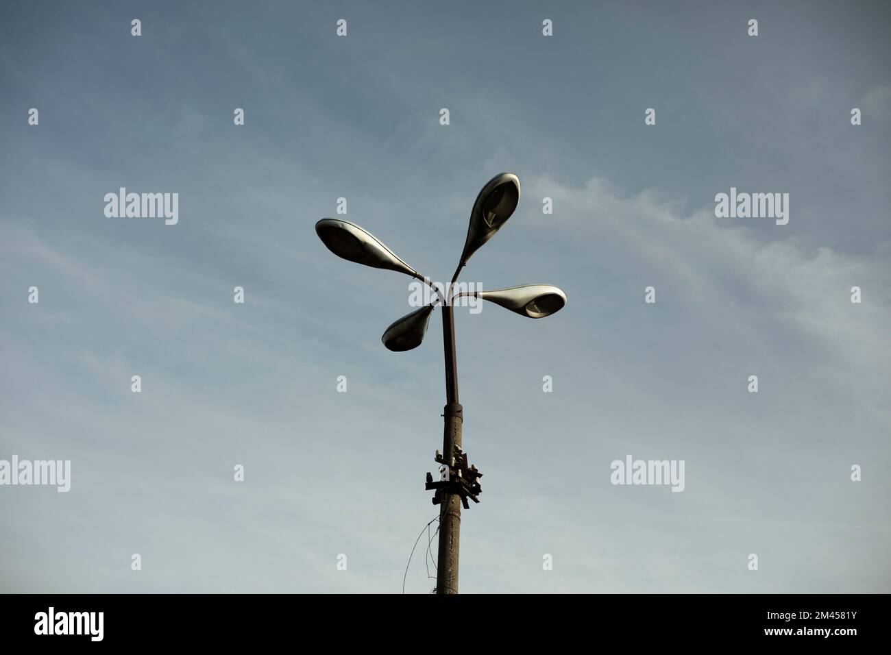 Four lamps on pole. Lighting fixture of old type. Old light pole Stock ...