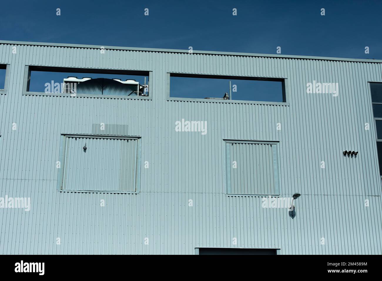 Factory building. Industrial structure. Closed factory Stock Photo - Alamy