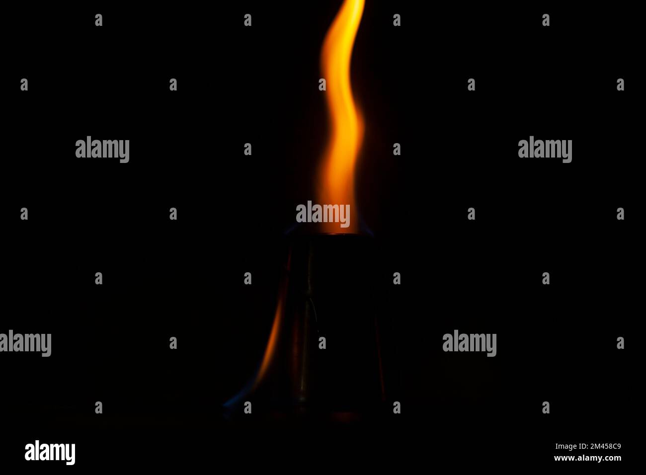 Flames in dark. One flame on black background. Ignition details. Fire ...