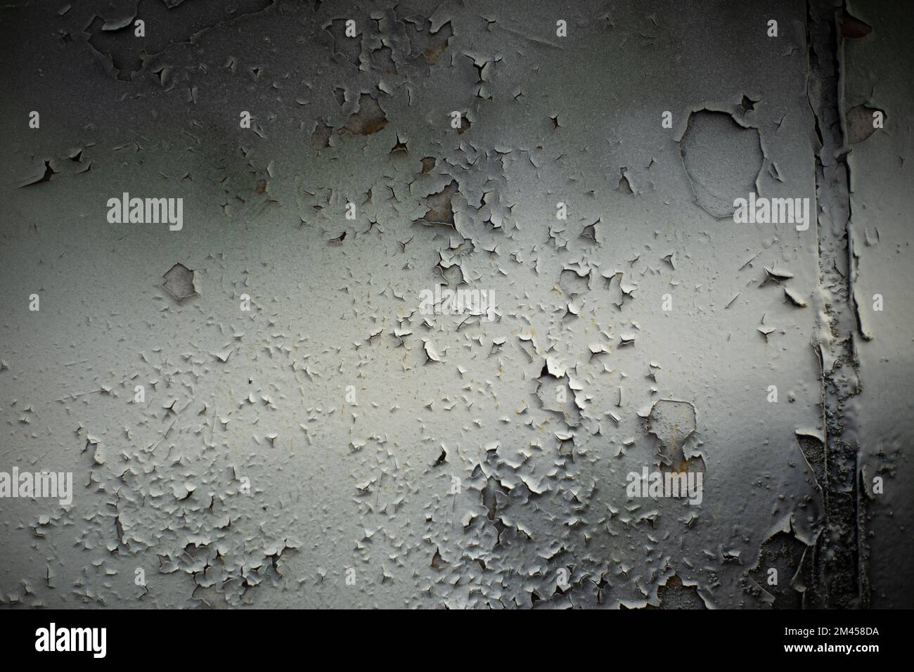 Old paint on wall. Grey wall. Flying paint. Damaged surface Stock Photo ...