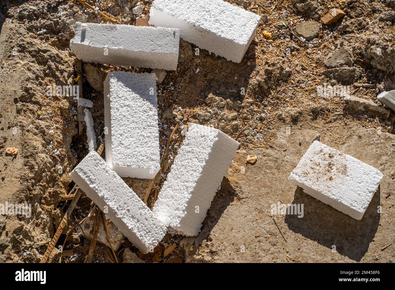 Styrofoam waste after facade insulation. polystyrene scraps on the ...
