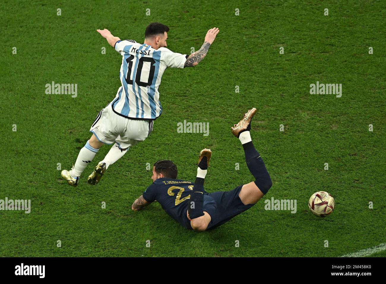 Lionel Messi of Argentina and Theo Hernandez of France during Argentina ...