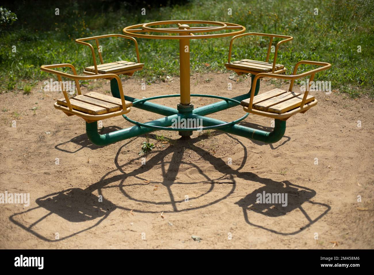 Children's playground in yard. Place for children to play. Carousels ...