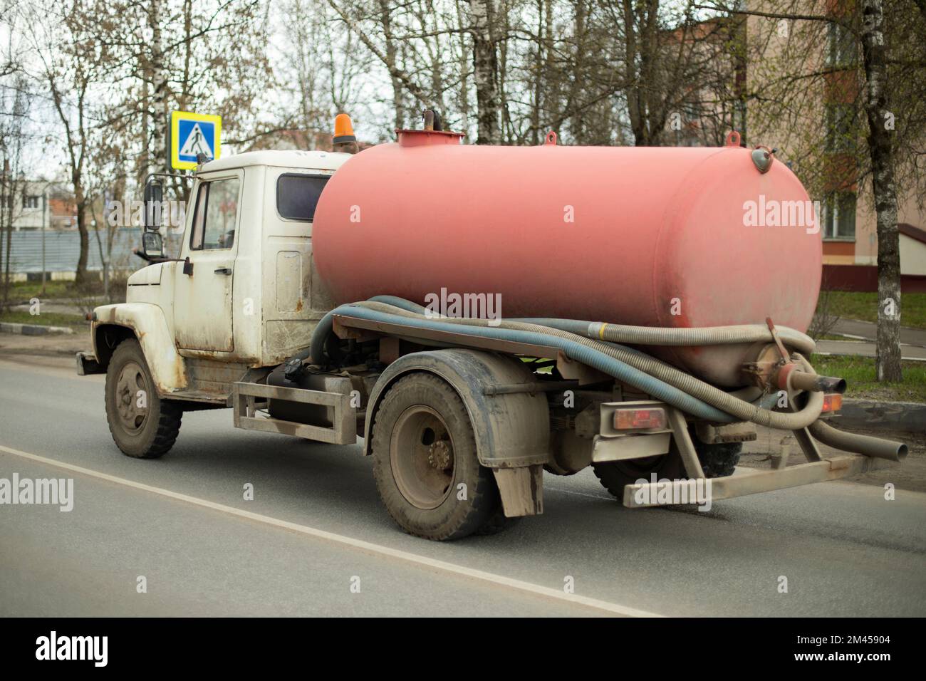 Car for pumping out sewers. Truck with tank. Old technique for pumping ...