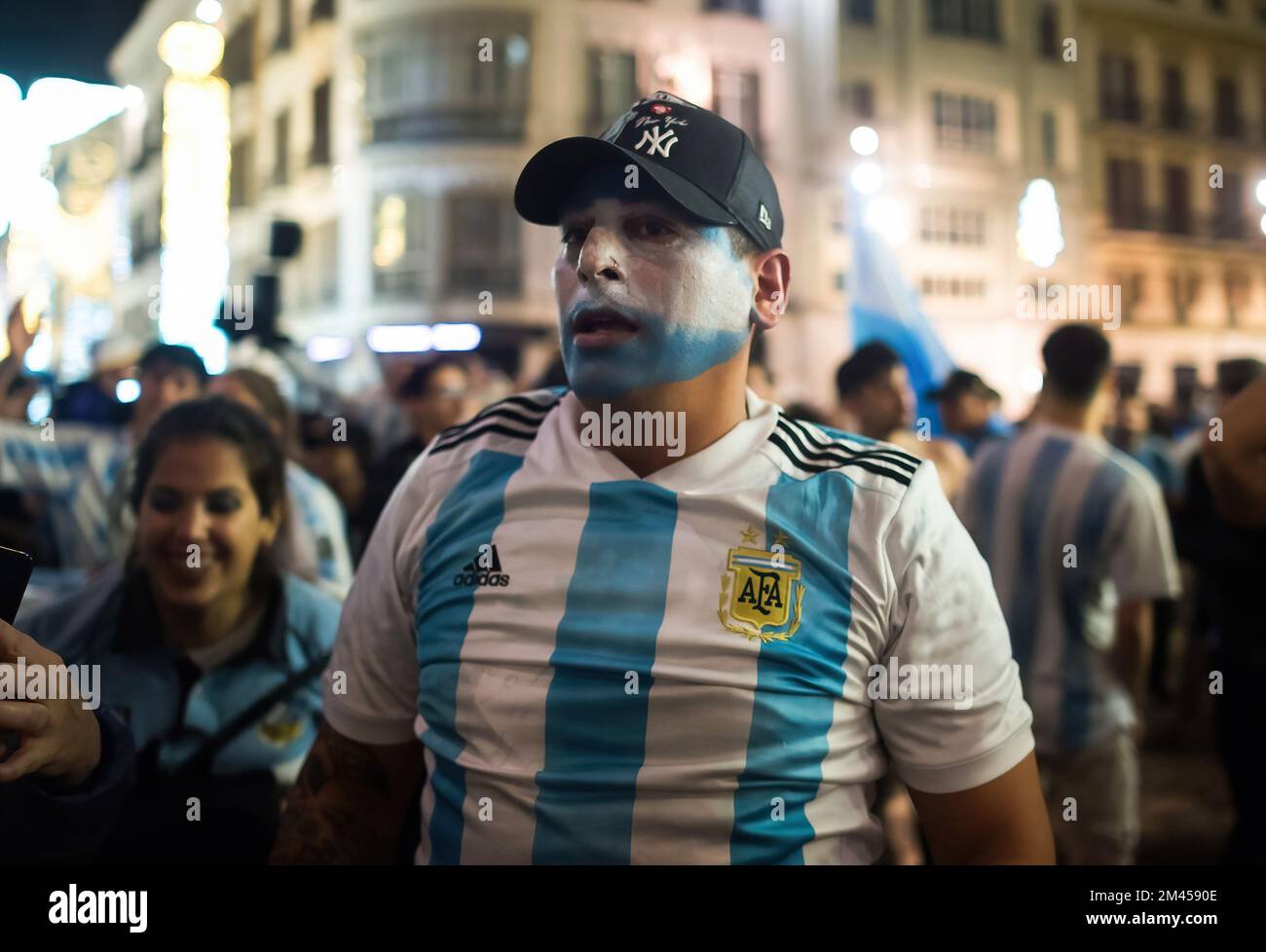 Malaga, Spain. 18th Dec, 2022. An Argentinian fan with his face painted ...