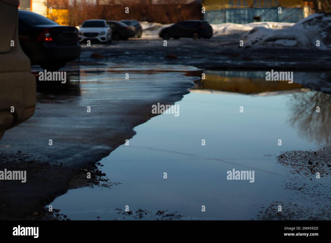 Puddle in road hi-res stock photography and images - Alamy