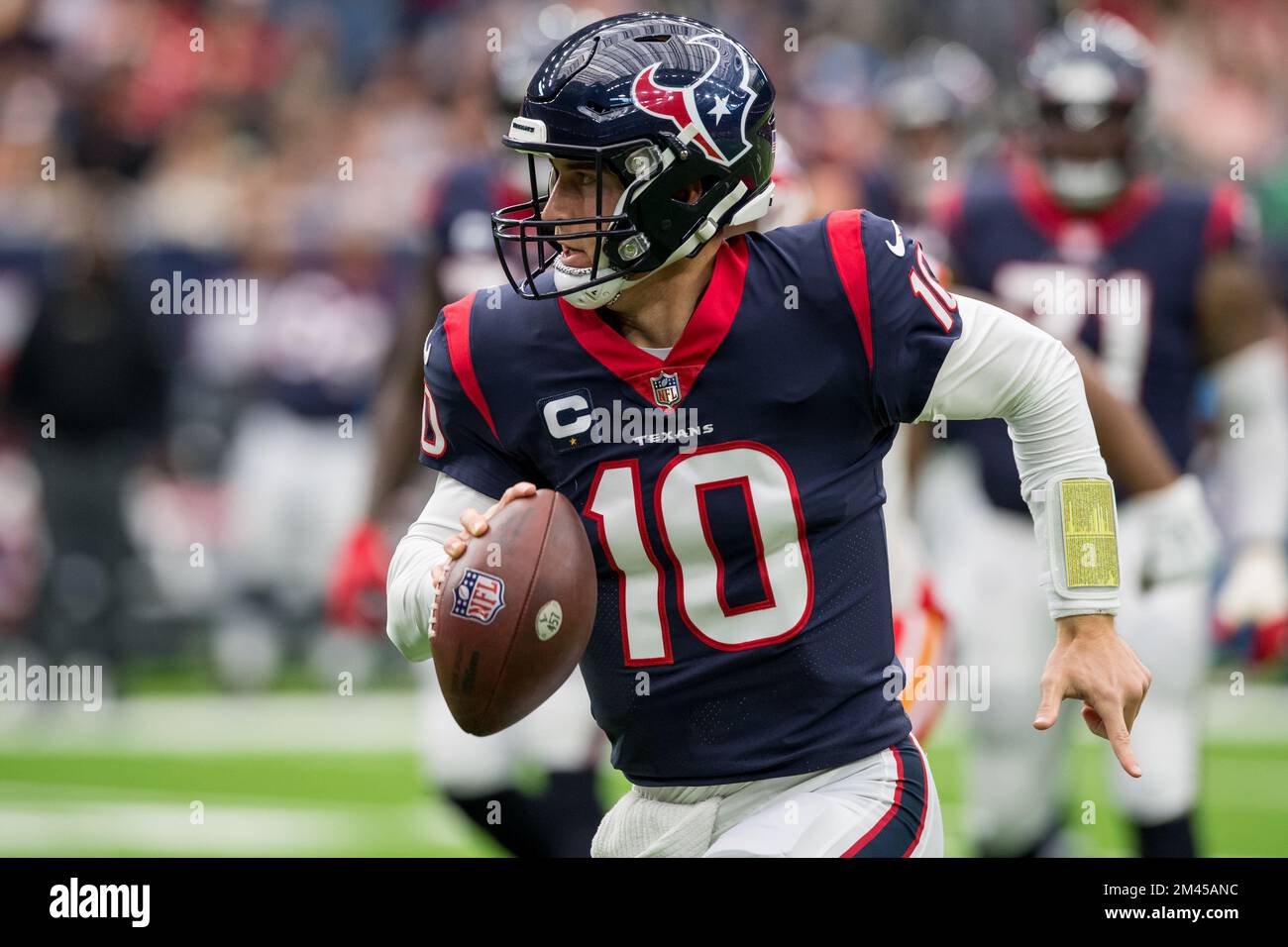 Houston, TX, USA. 18th Dec, 2022. Houston Texans quarterback Davis Mills (10) runs for a ...