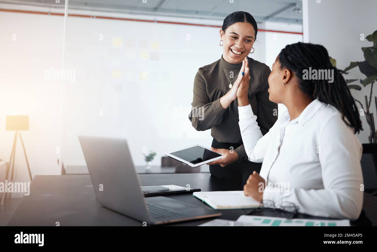 Teamwork, success and business women high five for support in office ...