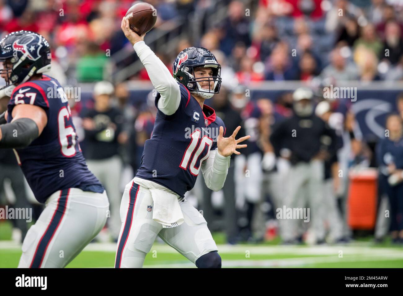 Houston, TX, USA. 18th Dec, 2022. Houston Texans quarterback Davis Mills (10) throws a pass ...
