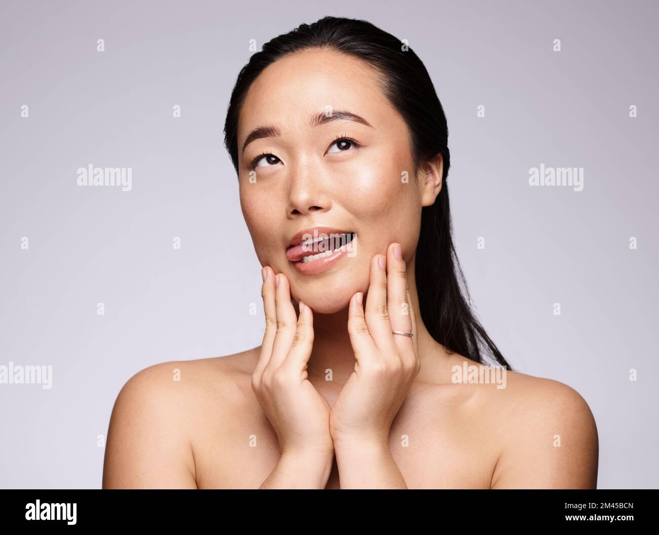 Asian woman, hands and face in beauty skincare for facial cosmetics ...