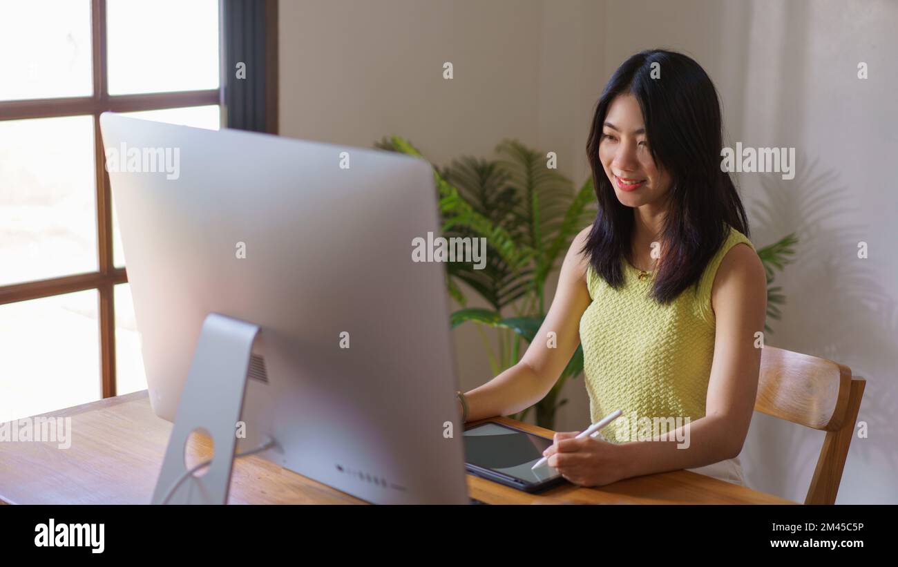 Hand embroidery concept, Women working on computer and sketches ...