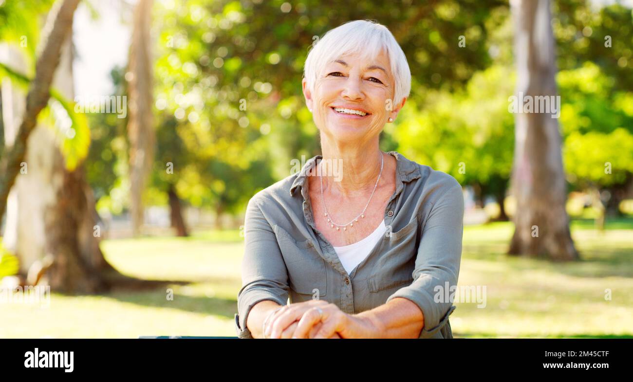 Her smile is still just as magical. Cropped portrait of a happy senior ...
