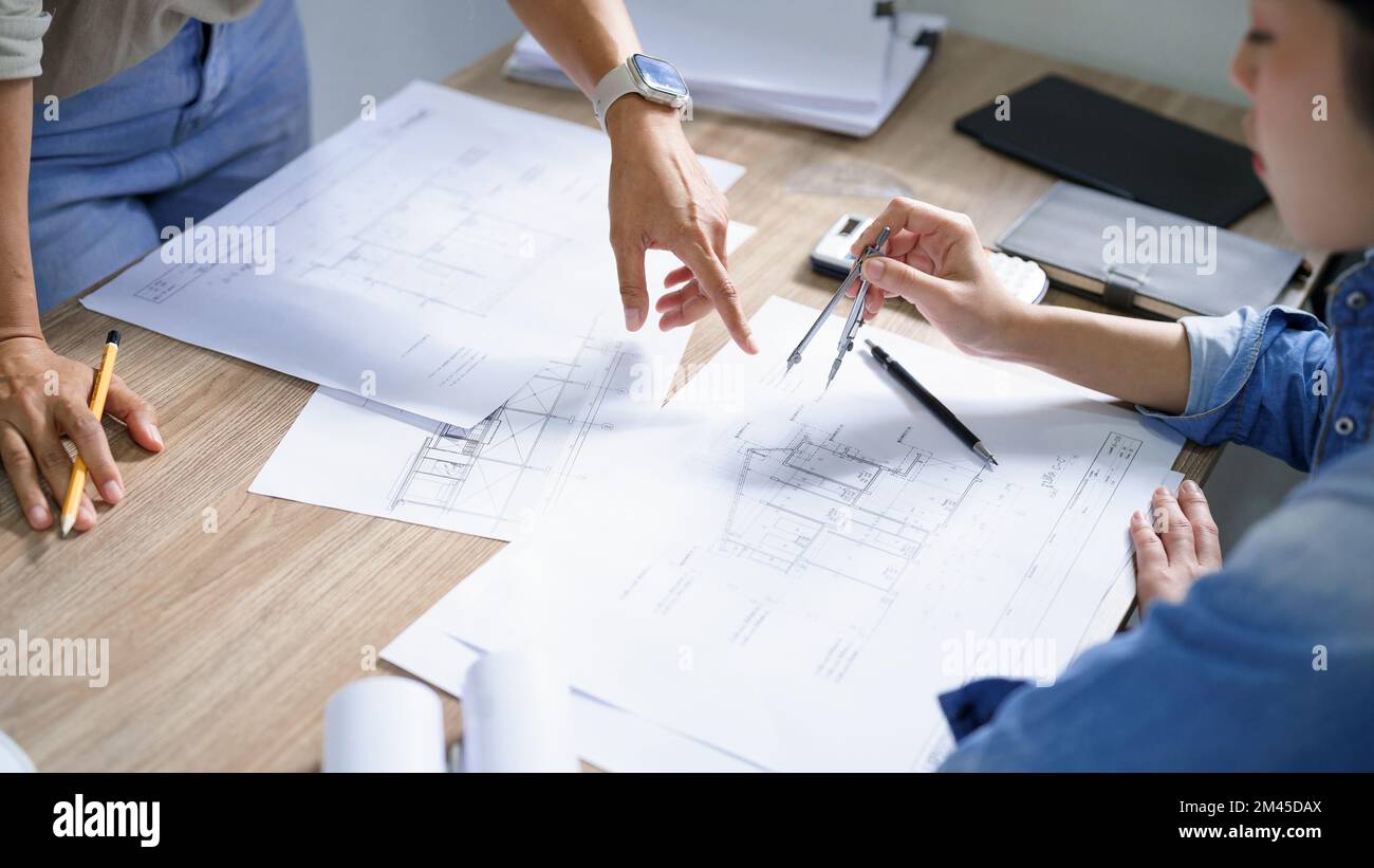 Engineering construction concept, Female engineer use geometry compass ...