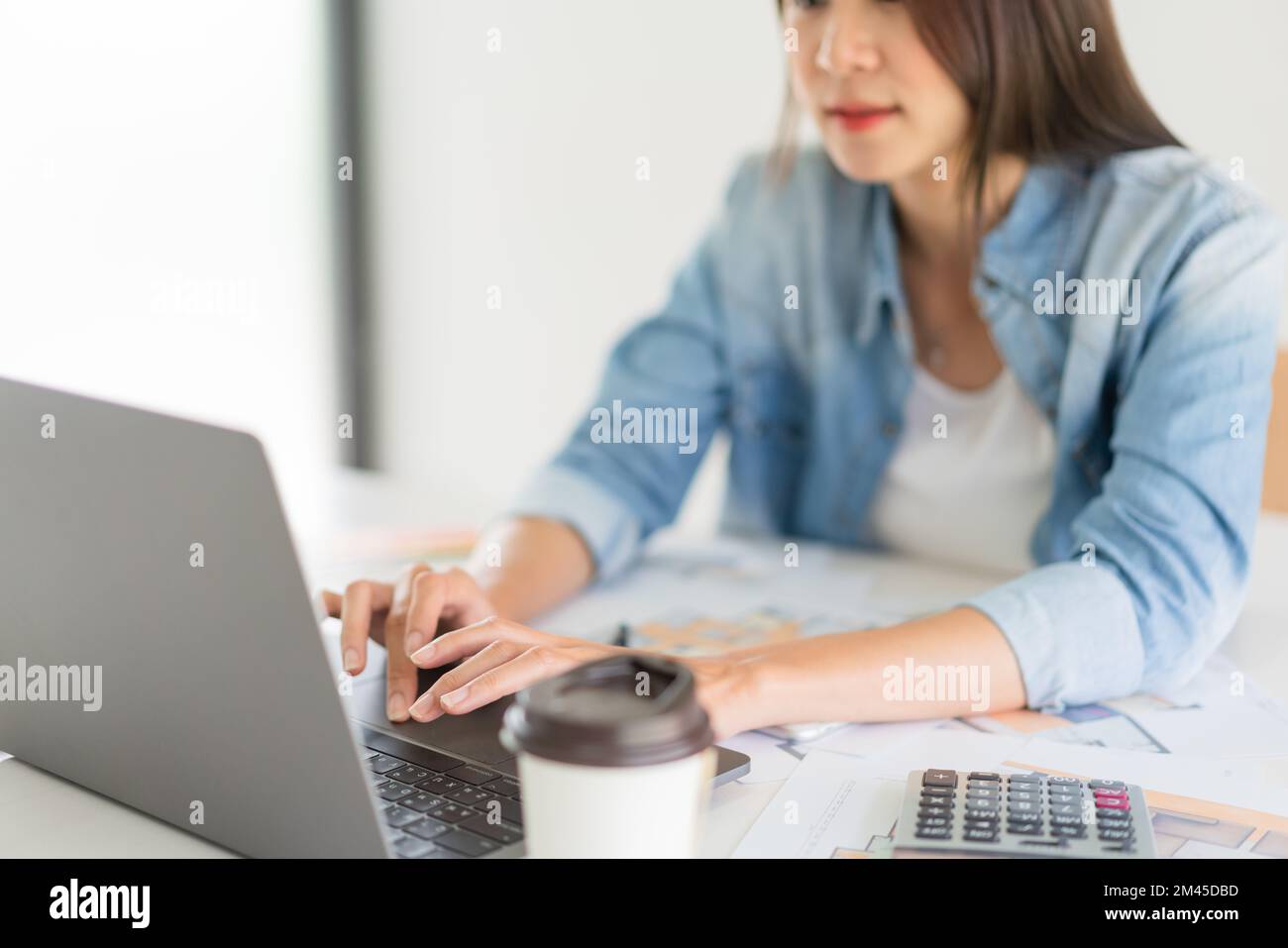 Construction design concept, Female architect use laptop to works and ...