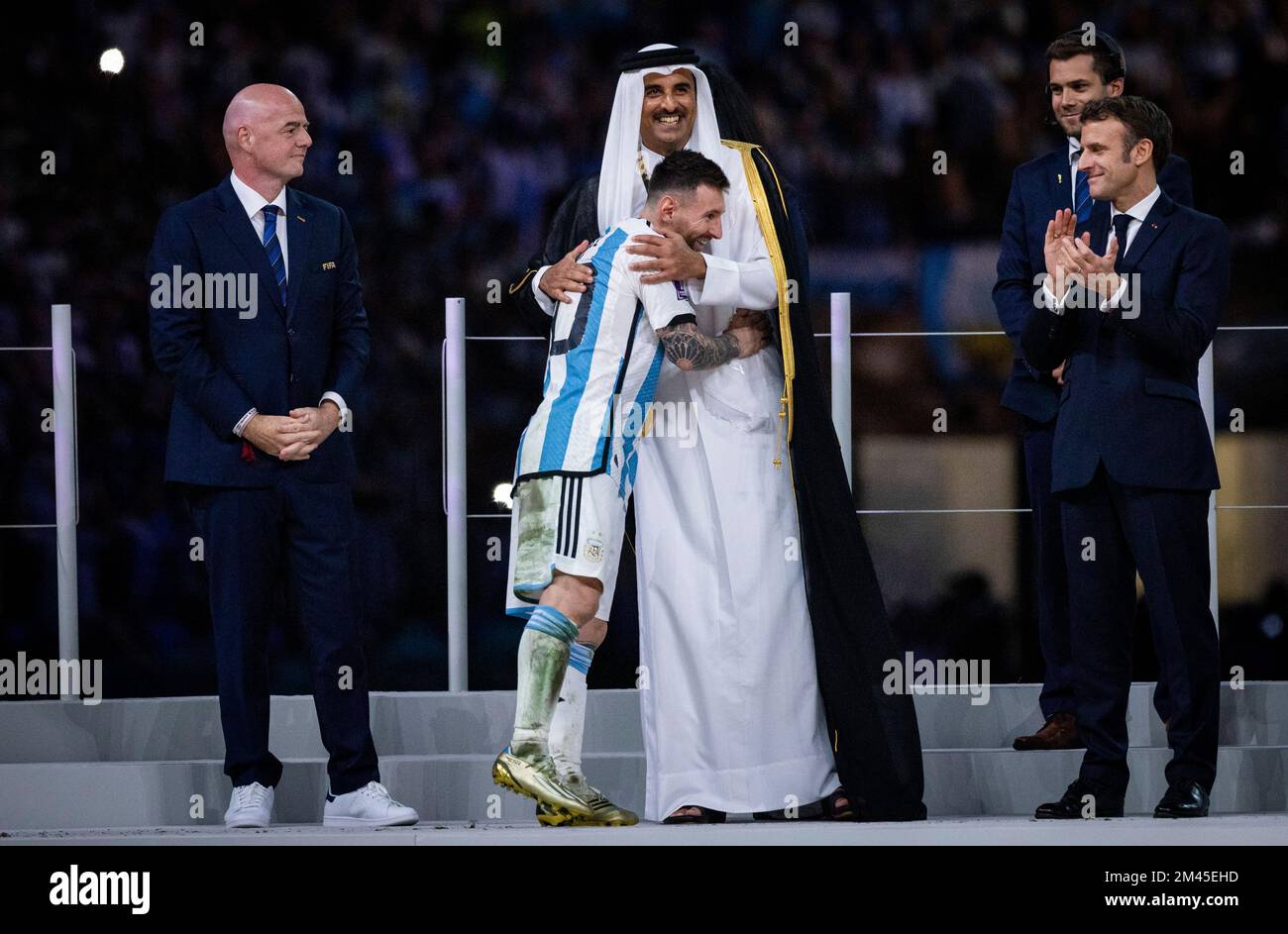 Doha, Qatar. 18th Dec, 2022. Lionel Messi of Argentina is embraced by ...