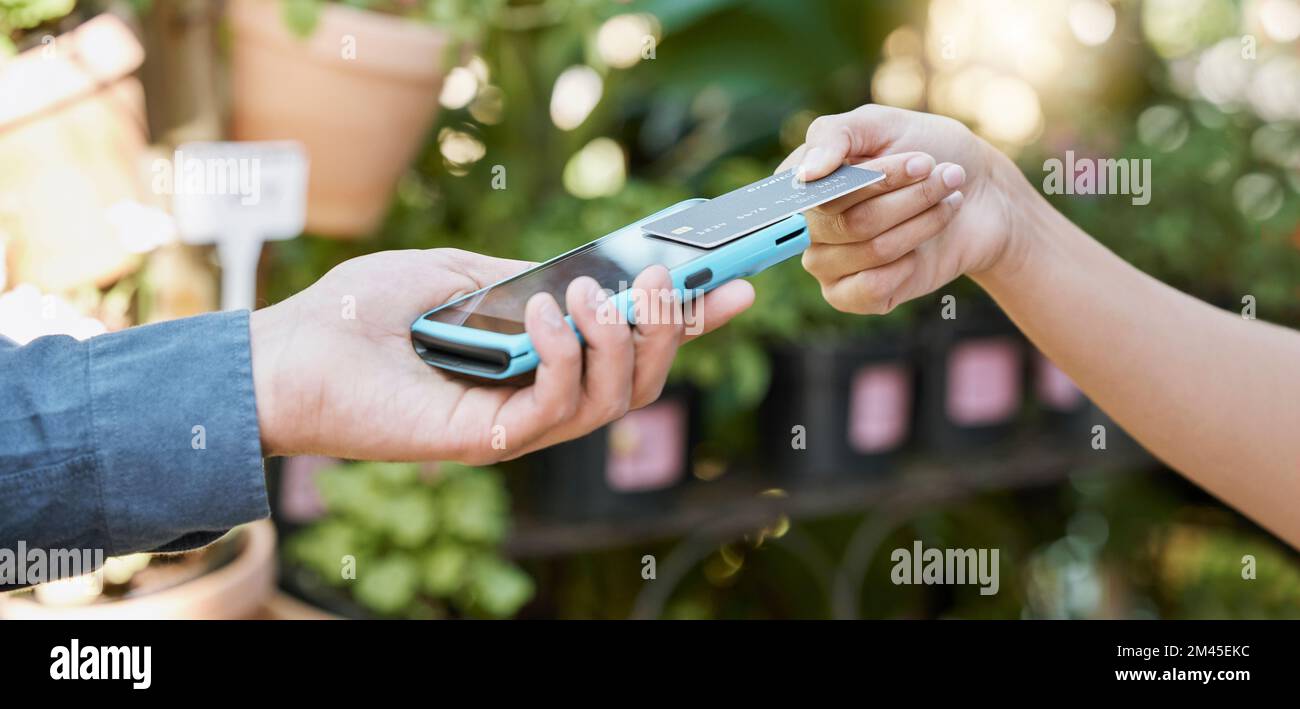Hands, payment and credit card with a customer using NFC technology to ...