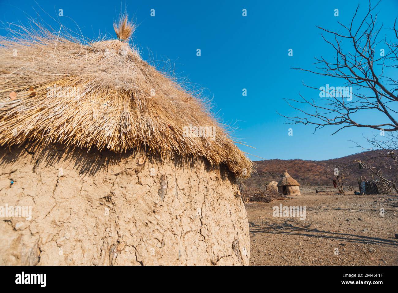 traditional Himba tribe hut with straw roof in Namibia Stock Photo - Alamy