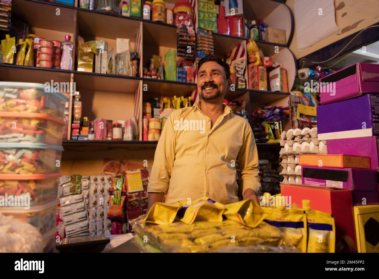 Store owner counter hi-res stock photography and images - Alamy