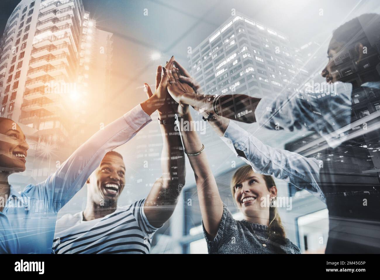 Business people high fiving in hi-res stock photography and images - Alamy