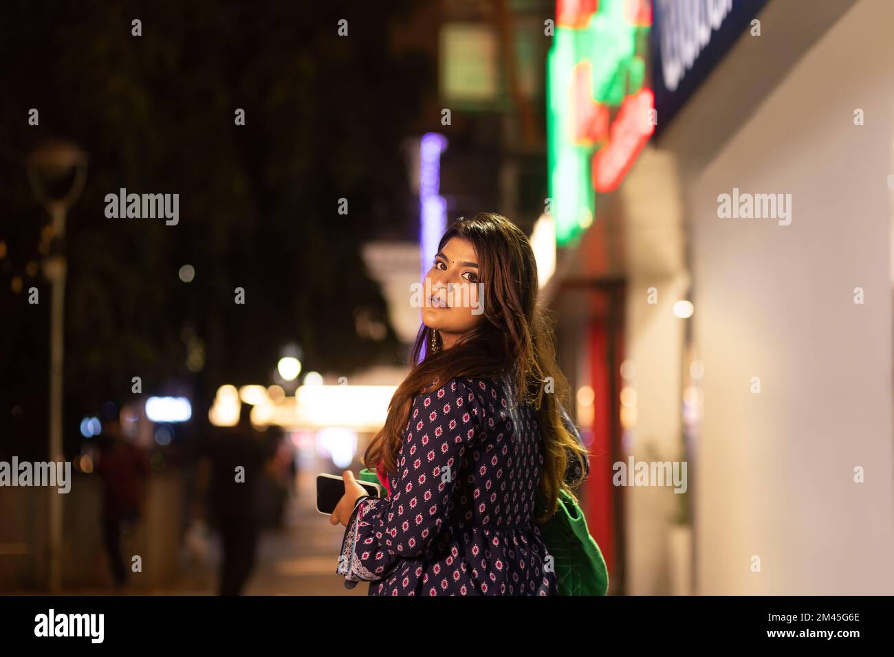 Looking back at camera hi-res stock photography and images - Alamy