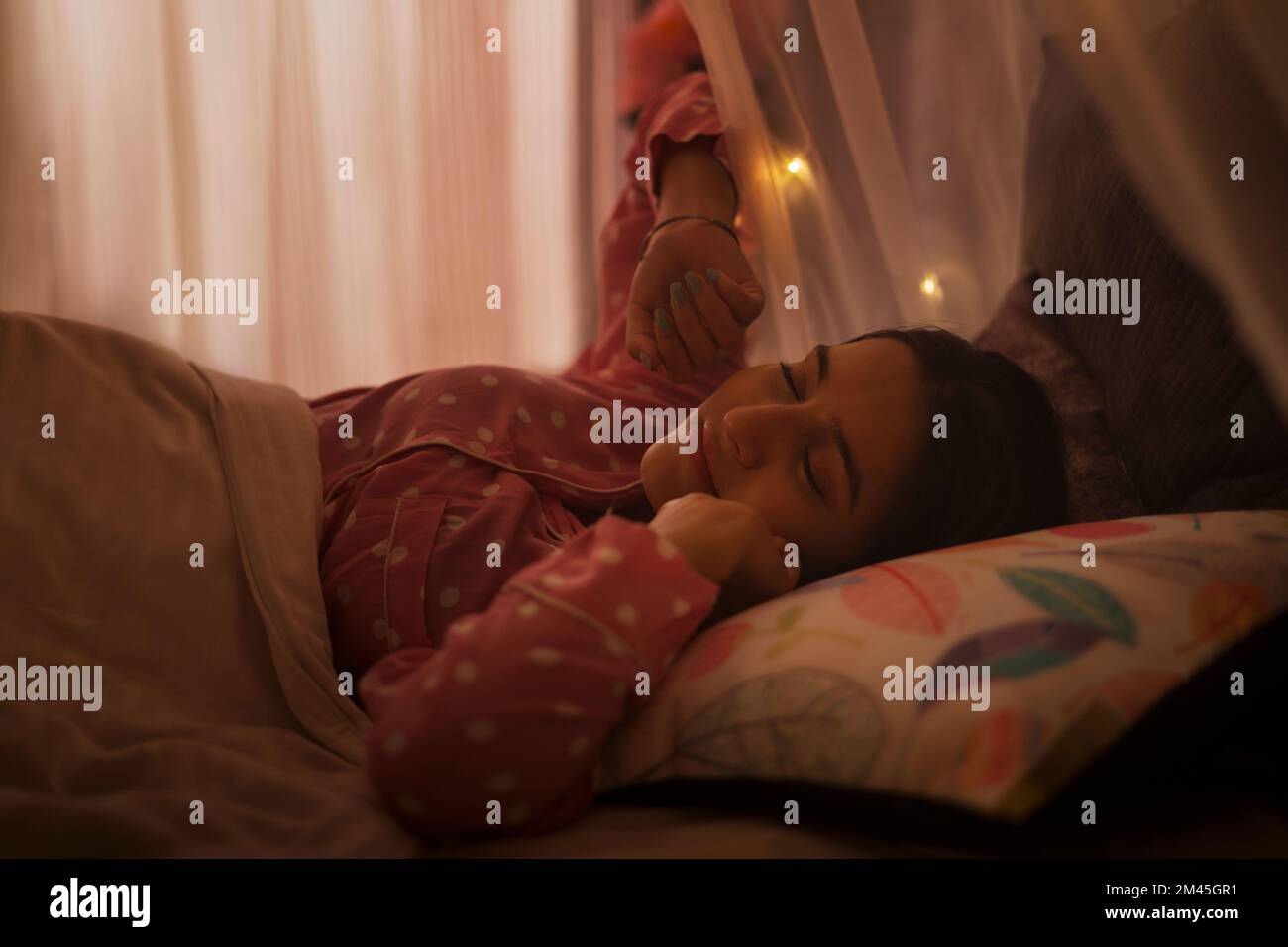 Beautiful teenage girl waking up after night sleep Stock Photo - Alamy